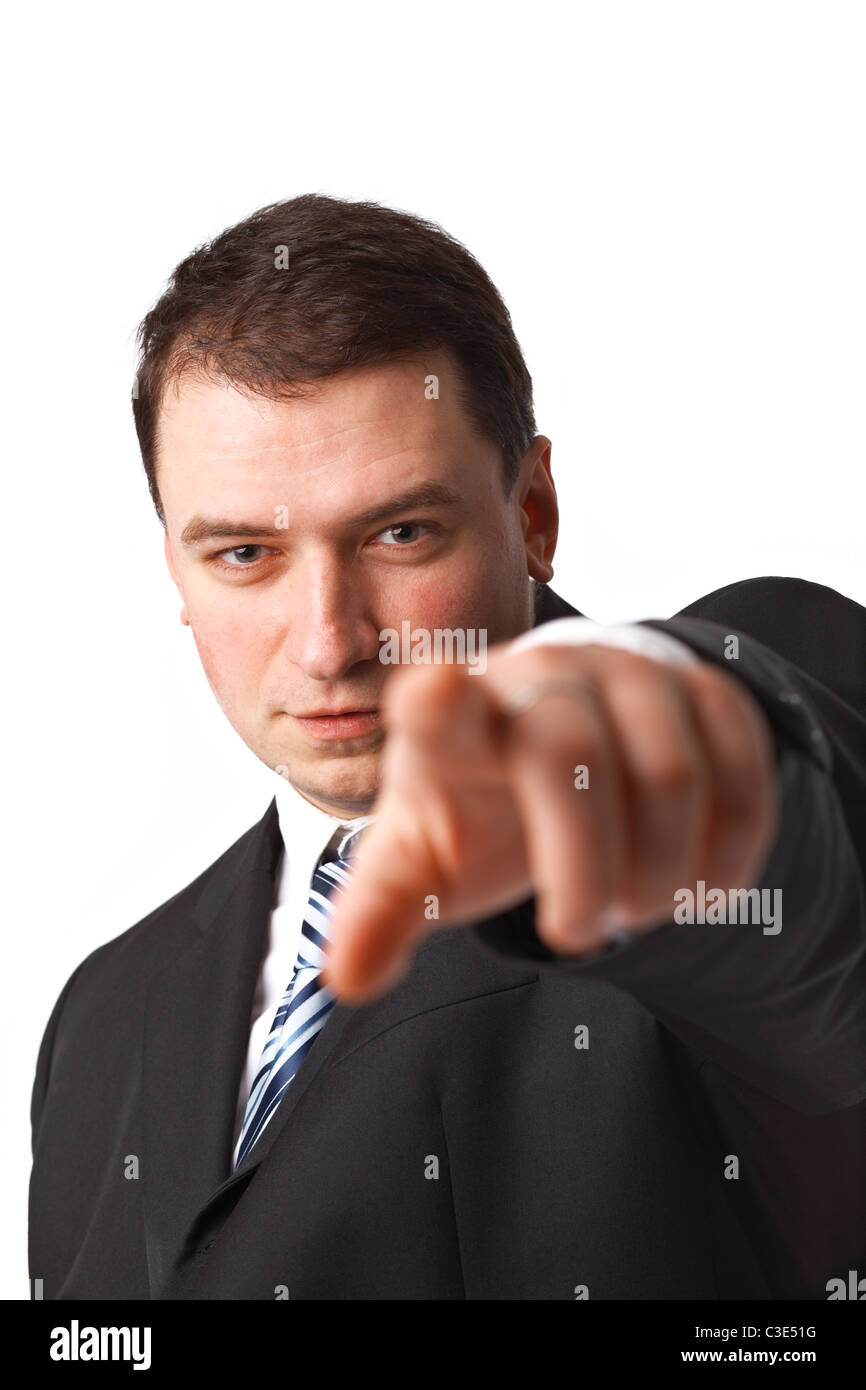 Close up portrait of young confident business man pointing to you ...