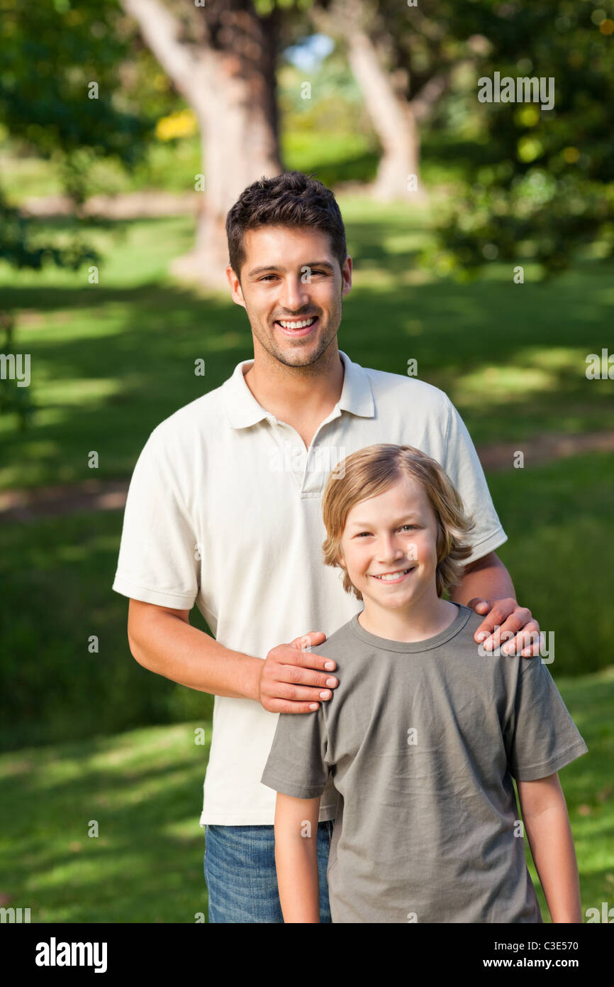 Son and his father in the park Stock Photo - Alamy
