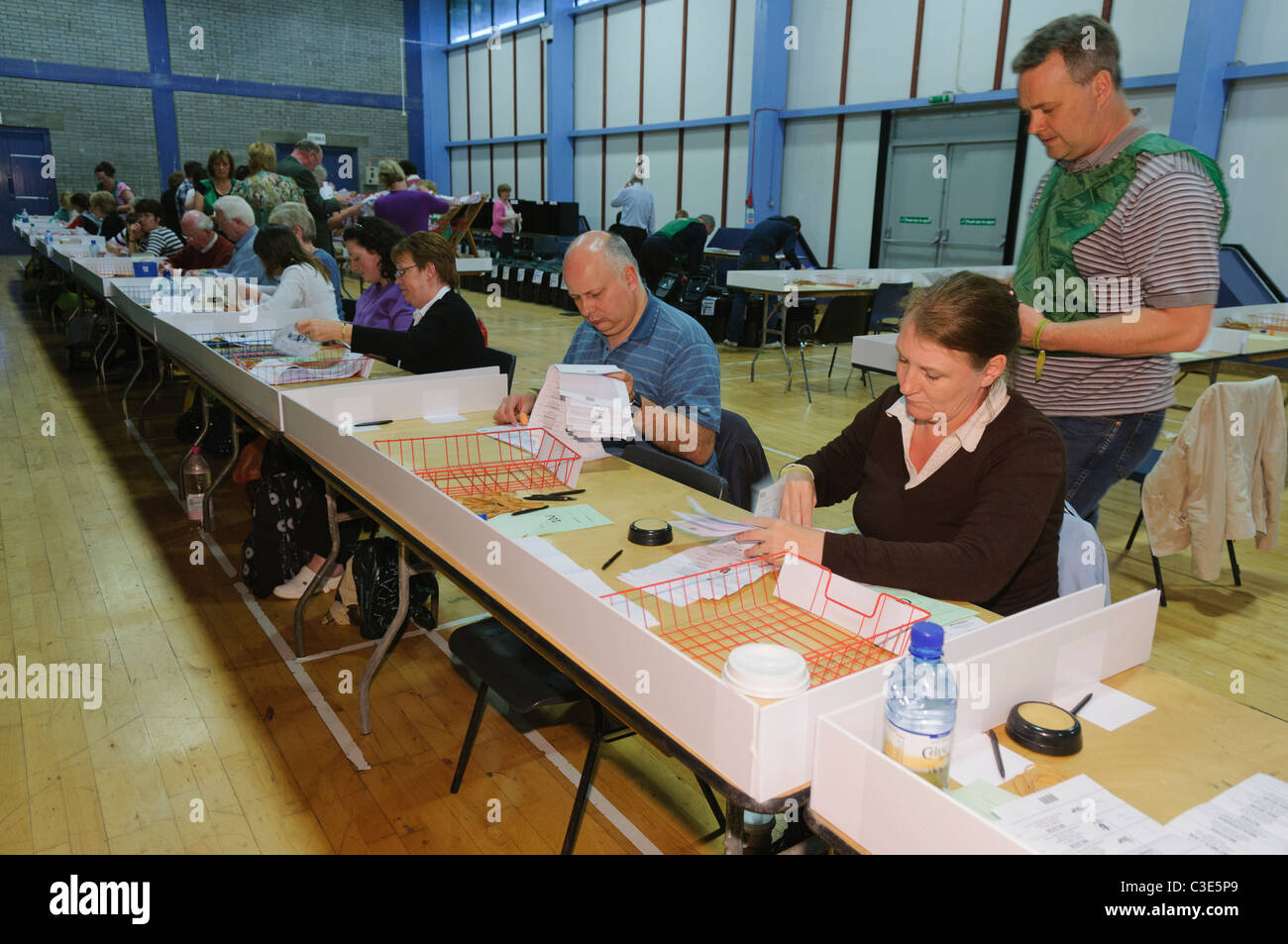 Counting votes at an election count centre Stock Photo - Alamy