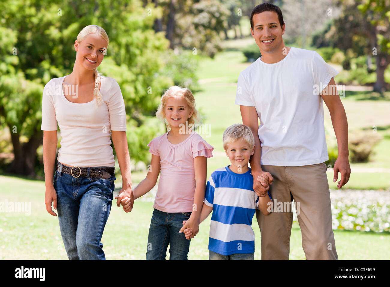 Adorable family during the summer Stock Photo - Alamy