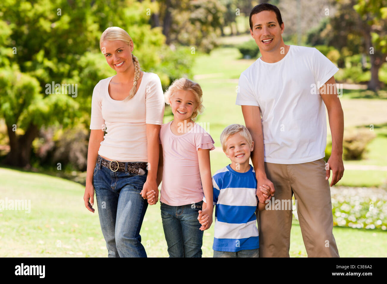 Adorable family during the summer Stock Photo - Alamy