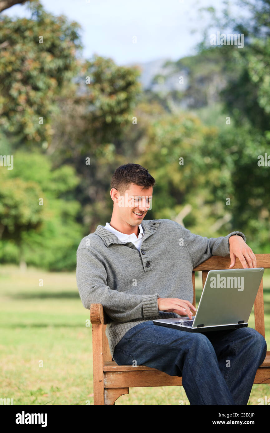 Man working on his laptop Stock Photo - Alamy