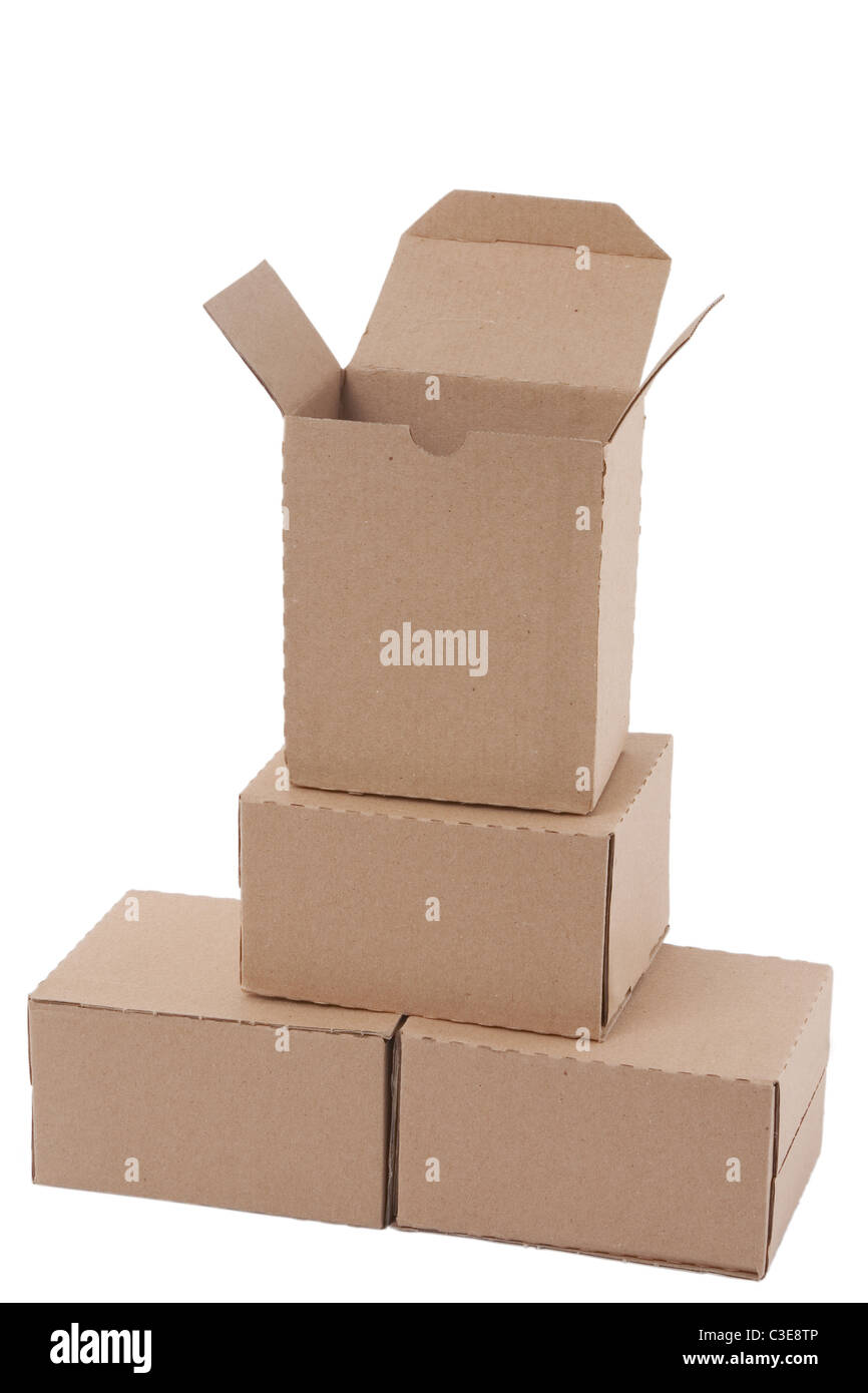 Brown cardboard boxes arranged in stack on white background Stock Photo ...