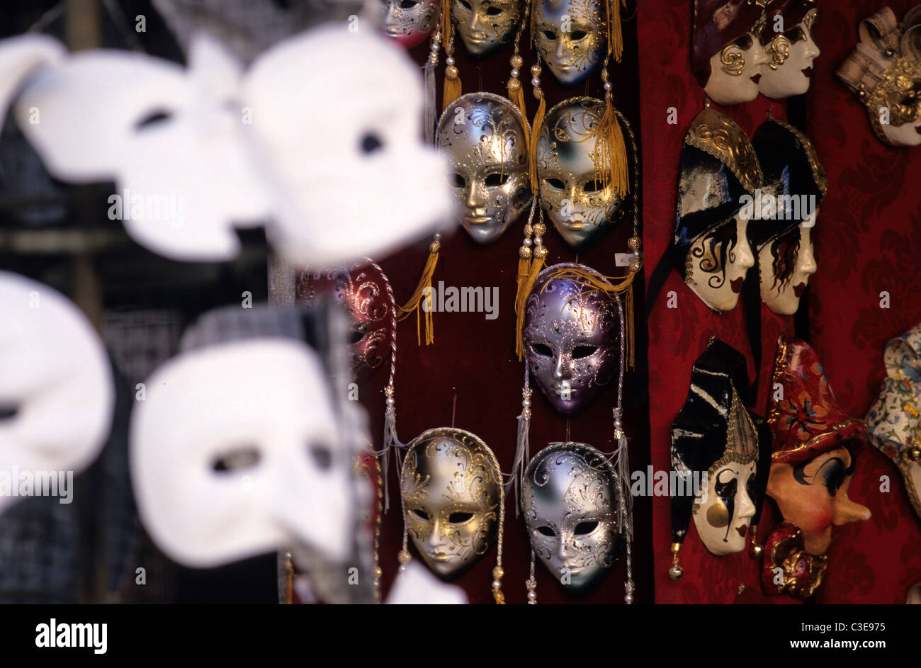 Venetian people wearing masks costumes hi-res stock photography and ...