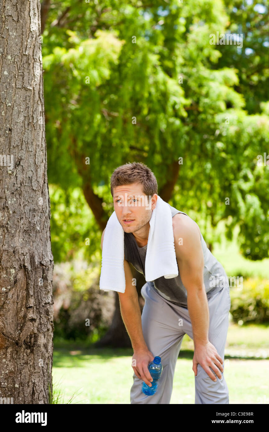 Man exhausted after the gym Stock Photo - Alamy