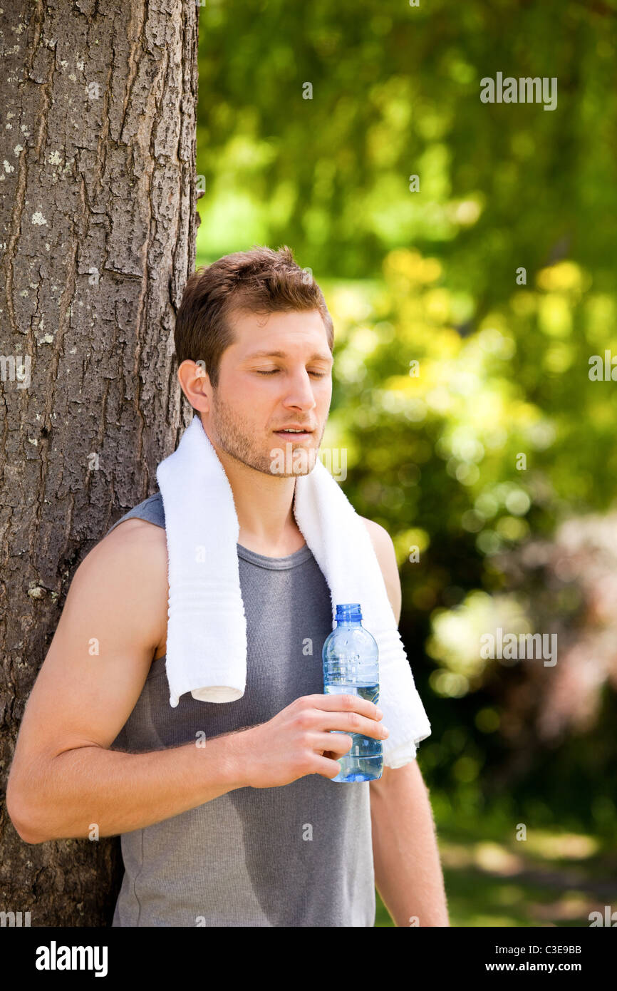Man exhausted after the gym Stock Photo - Alamy