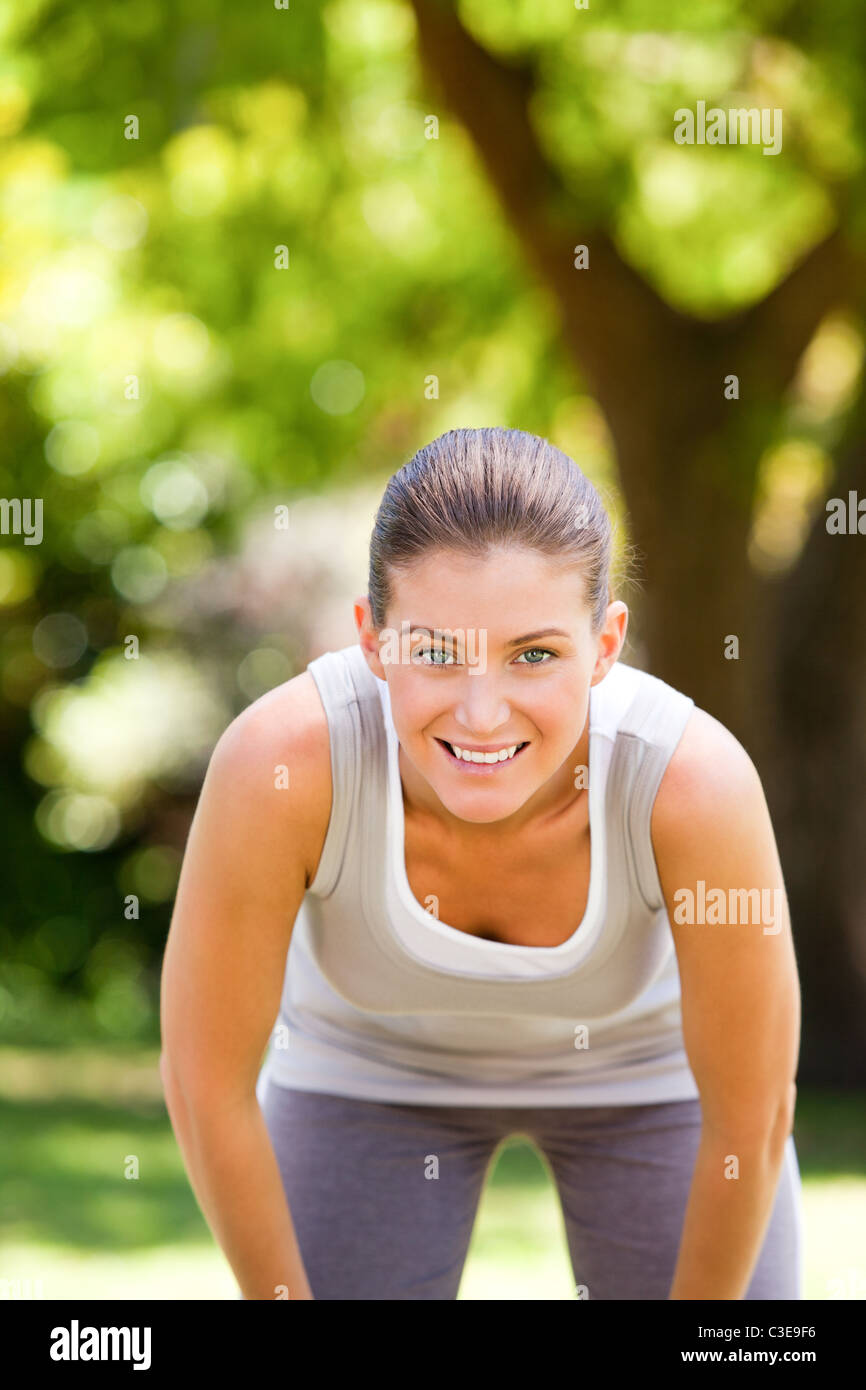 Tired woman in the park Stock Photo - Alamy
