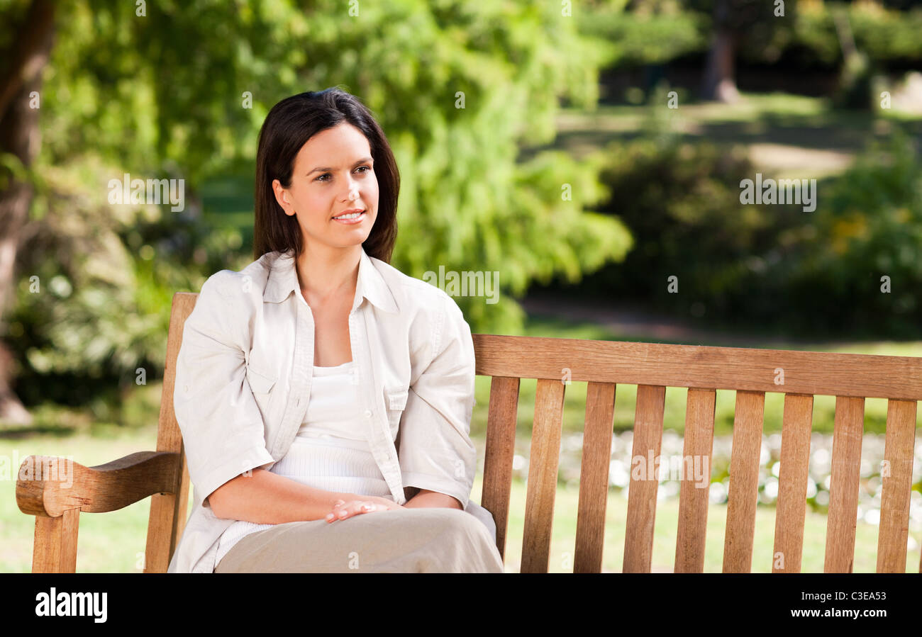 Young woman on the bench Stock Photo - Alamy