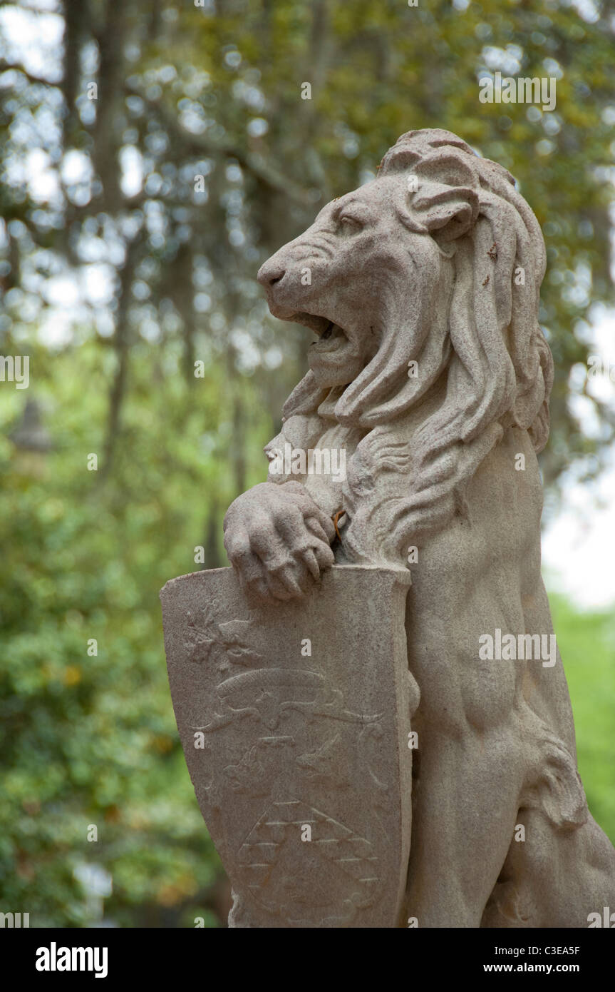 Georgia, Savannah. Chippewa Park, decorative lion statue holding shield ...