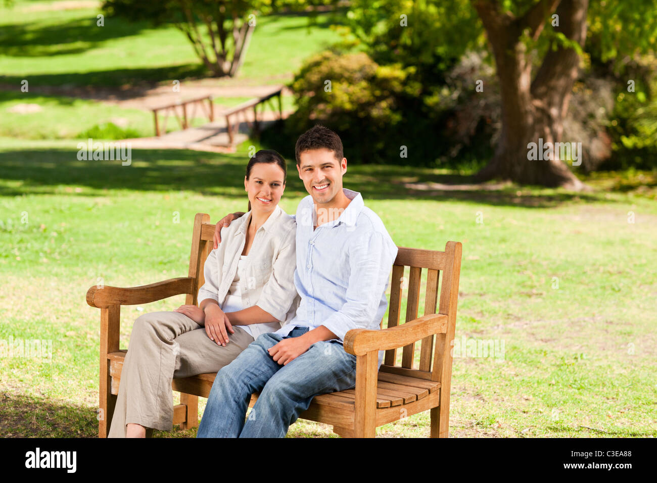 Couple on the bench Stock Photo - Alamy