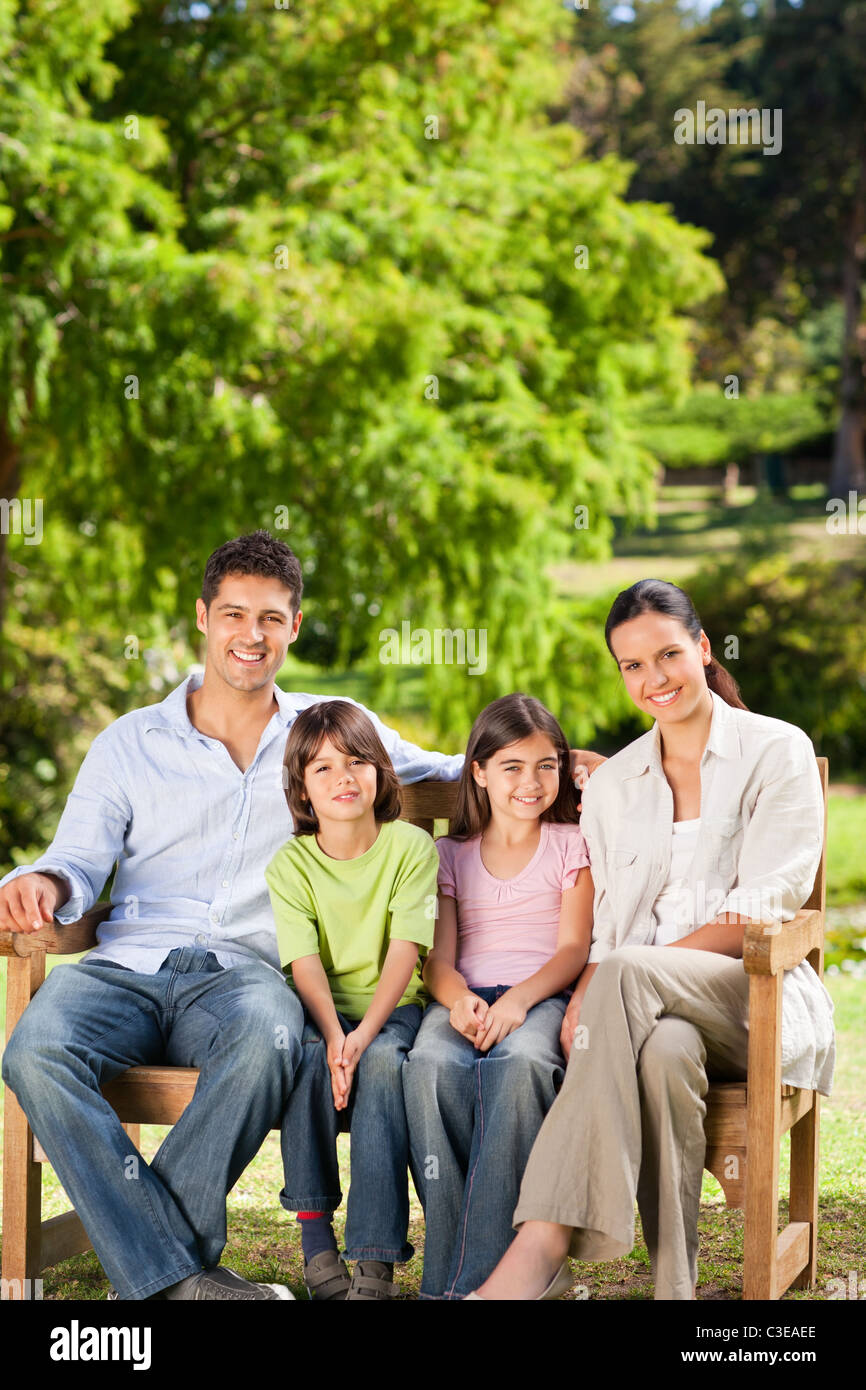 Family on the bench Stock Photo - Alamy