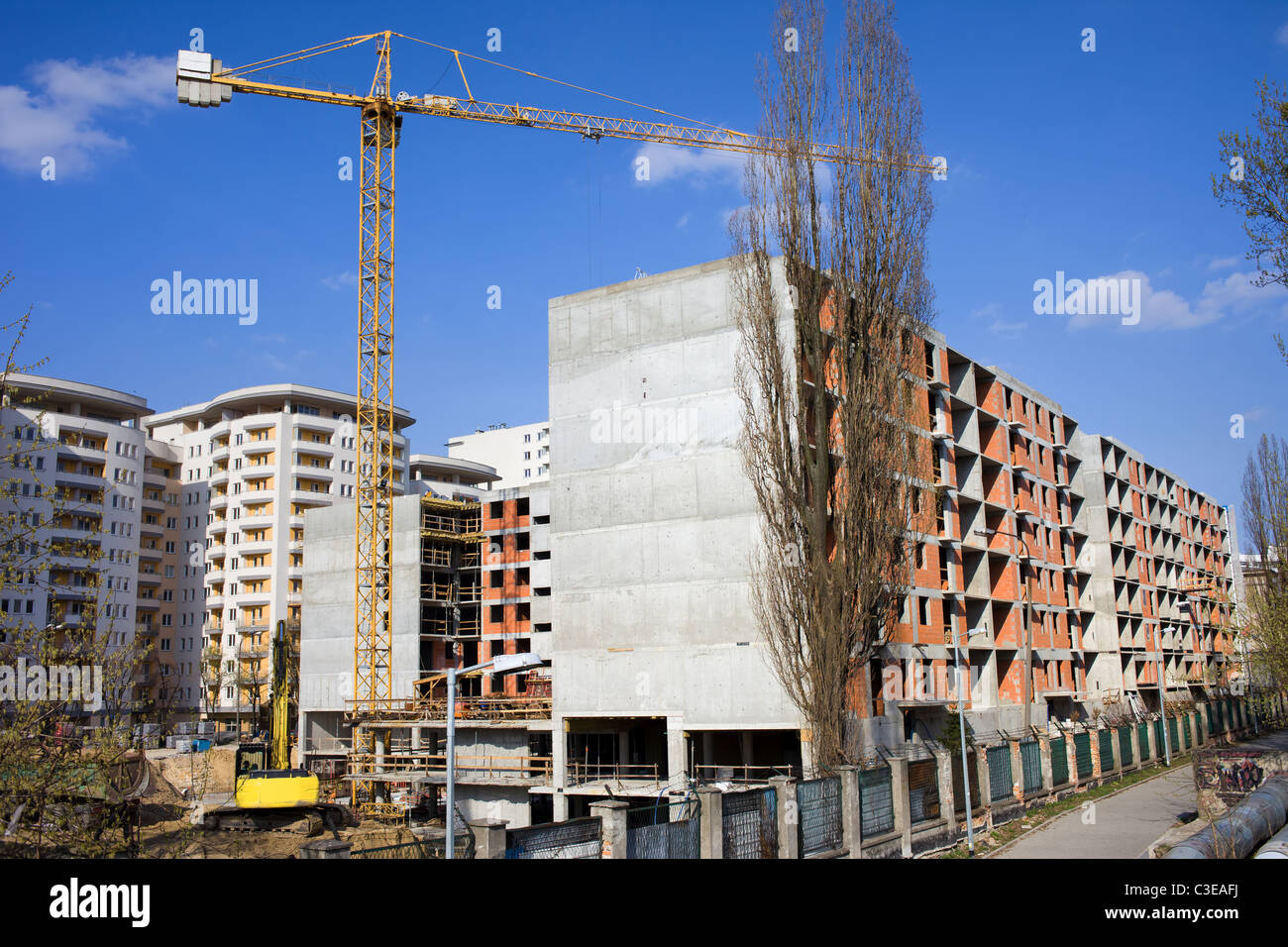 Construction site of an apartment block with concrete frame and brick ...