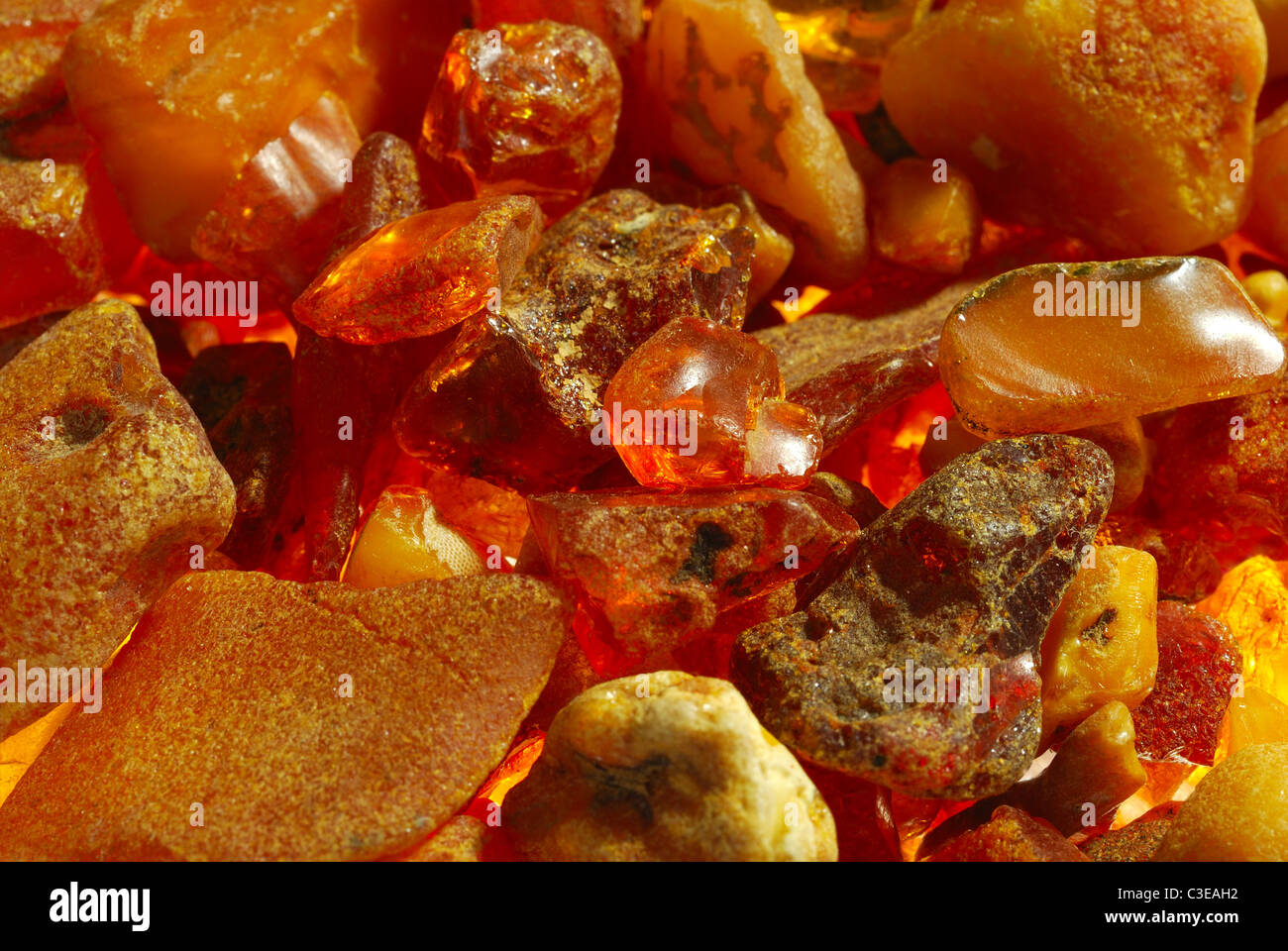 Raw yellow amber background Stock Photo - Alamy