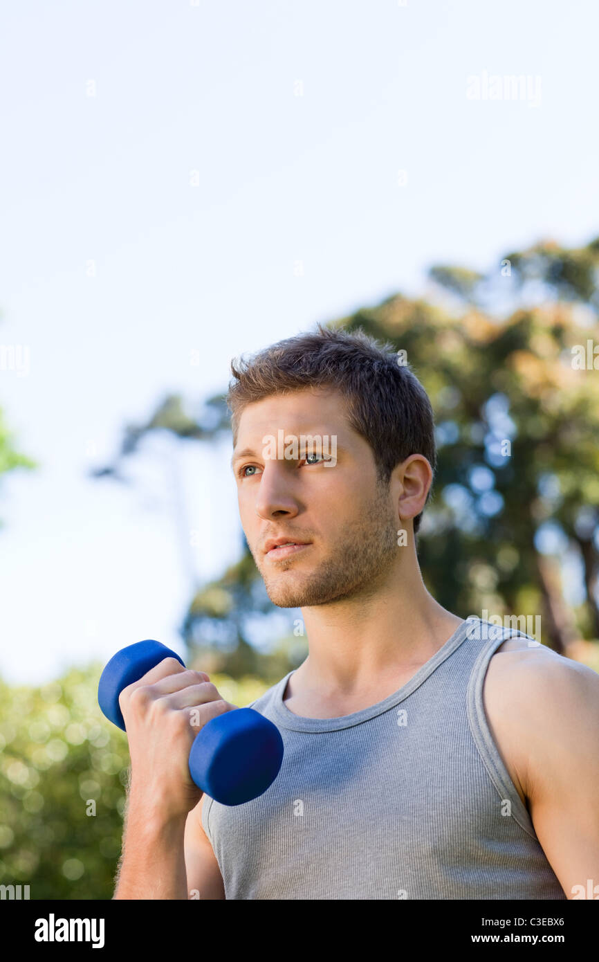 Man doing his exercises in the park Stock Photo - Alamy