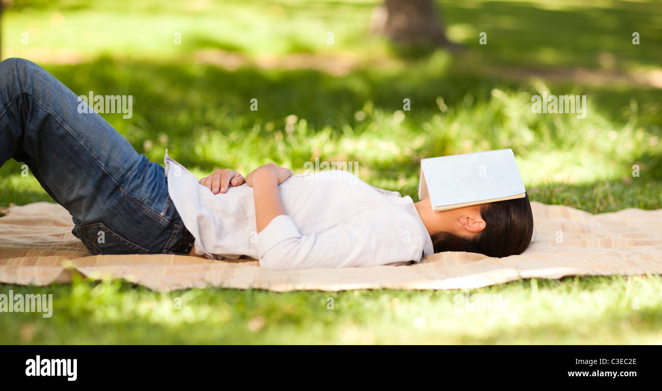 Woman sleeping with her book Stock Photo - Alamy
