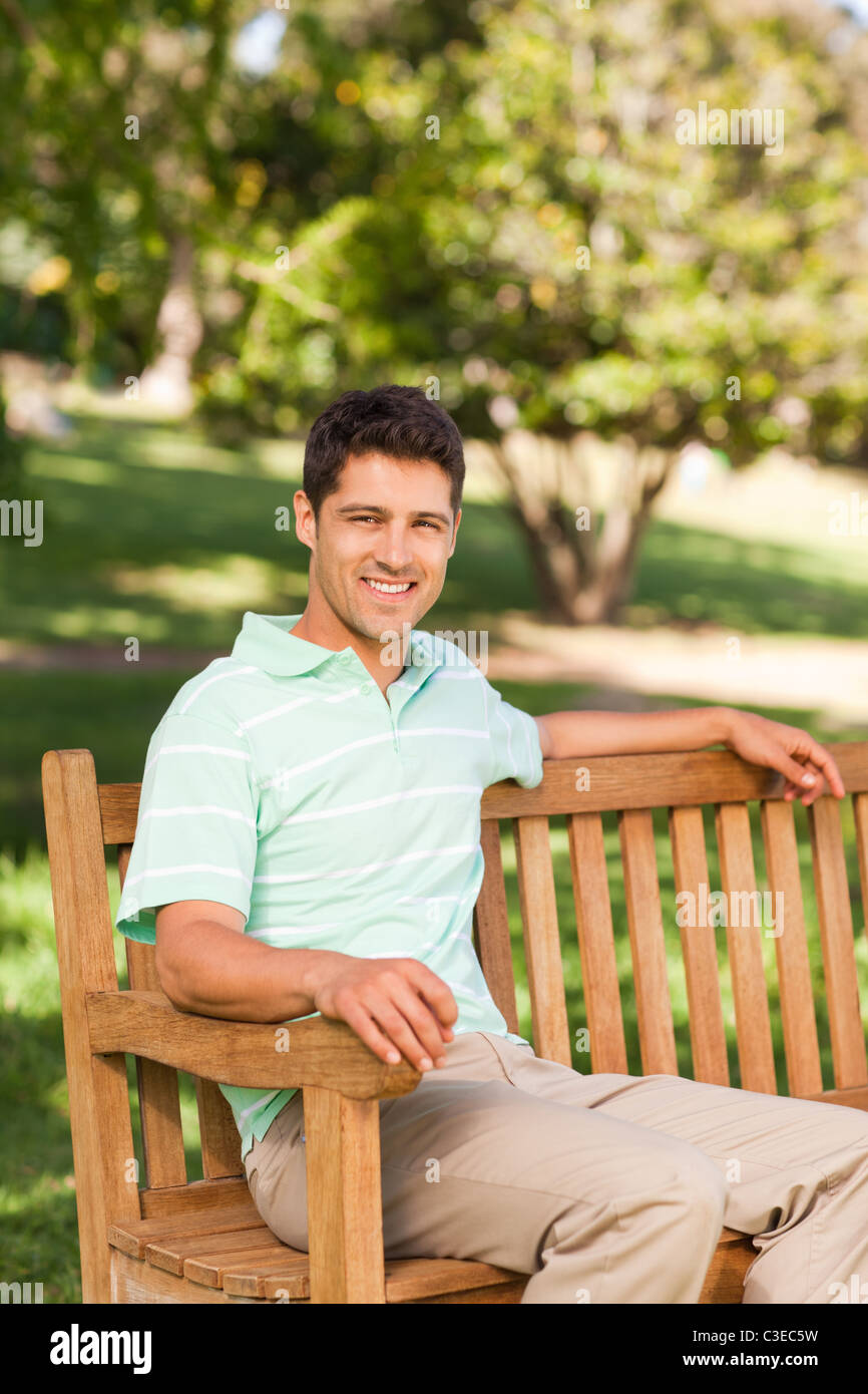Handsome man on the bench Stock Photo - Alamy