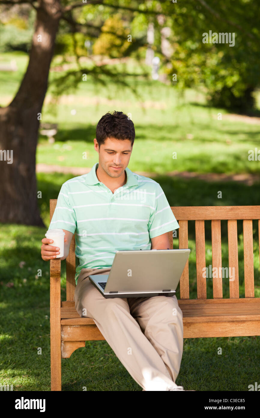 Man working on his laptop Stock Photo - Alamy