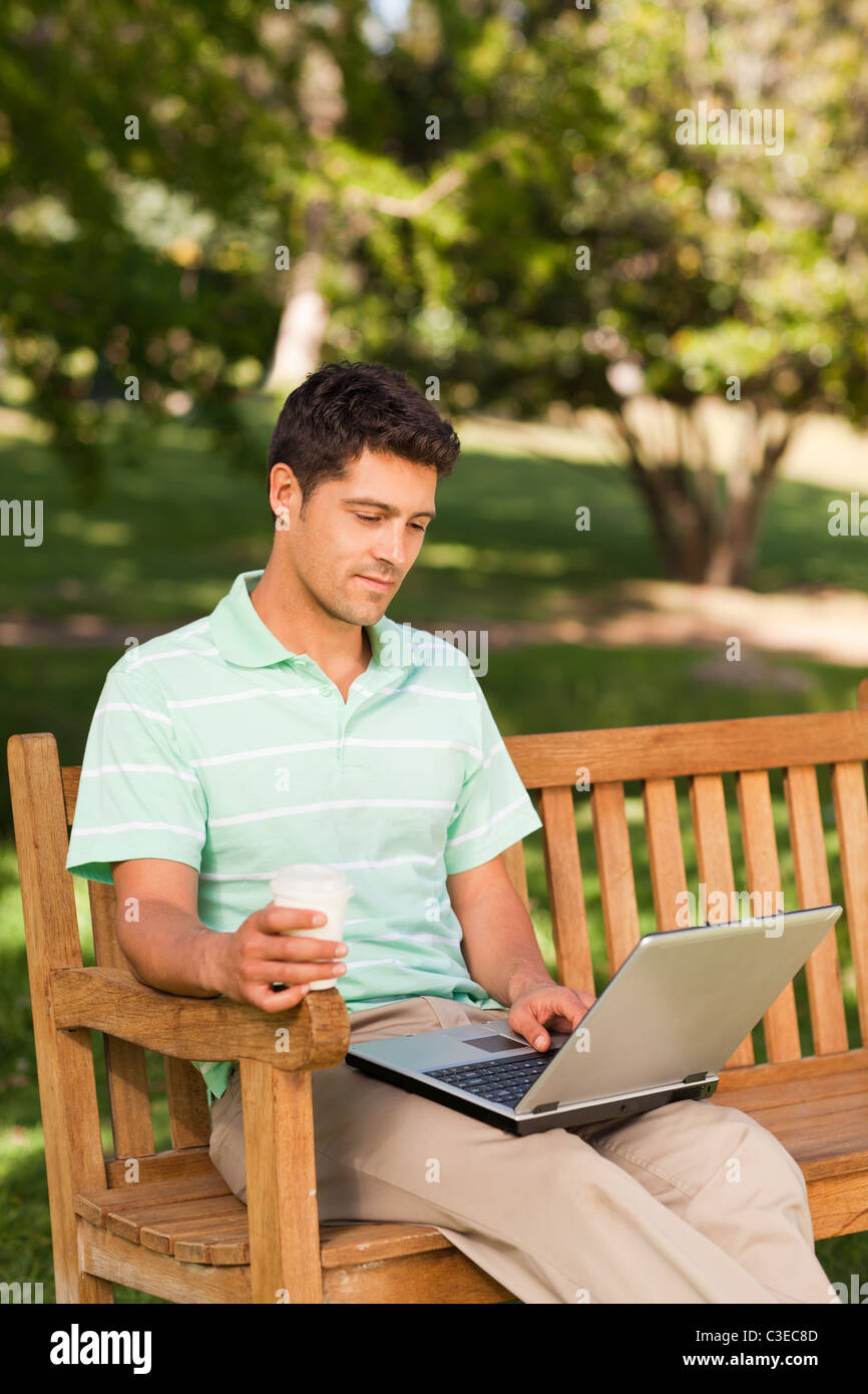 Man working on his laptop Stock Photo - Alamy
