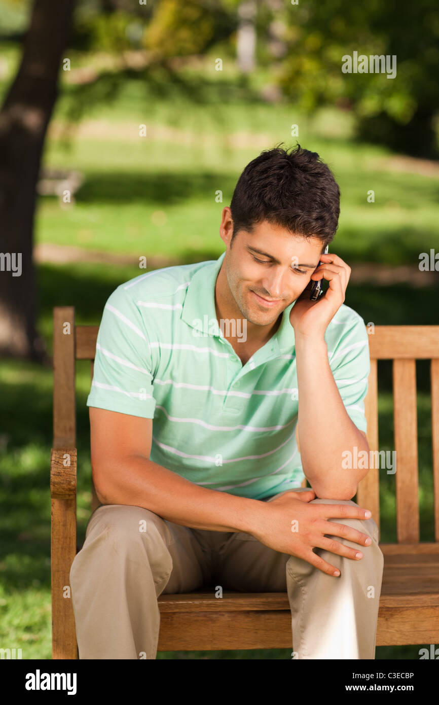 Young handsome man phoning Stock Photo - Alamy
