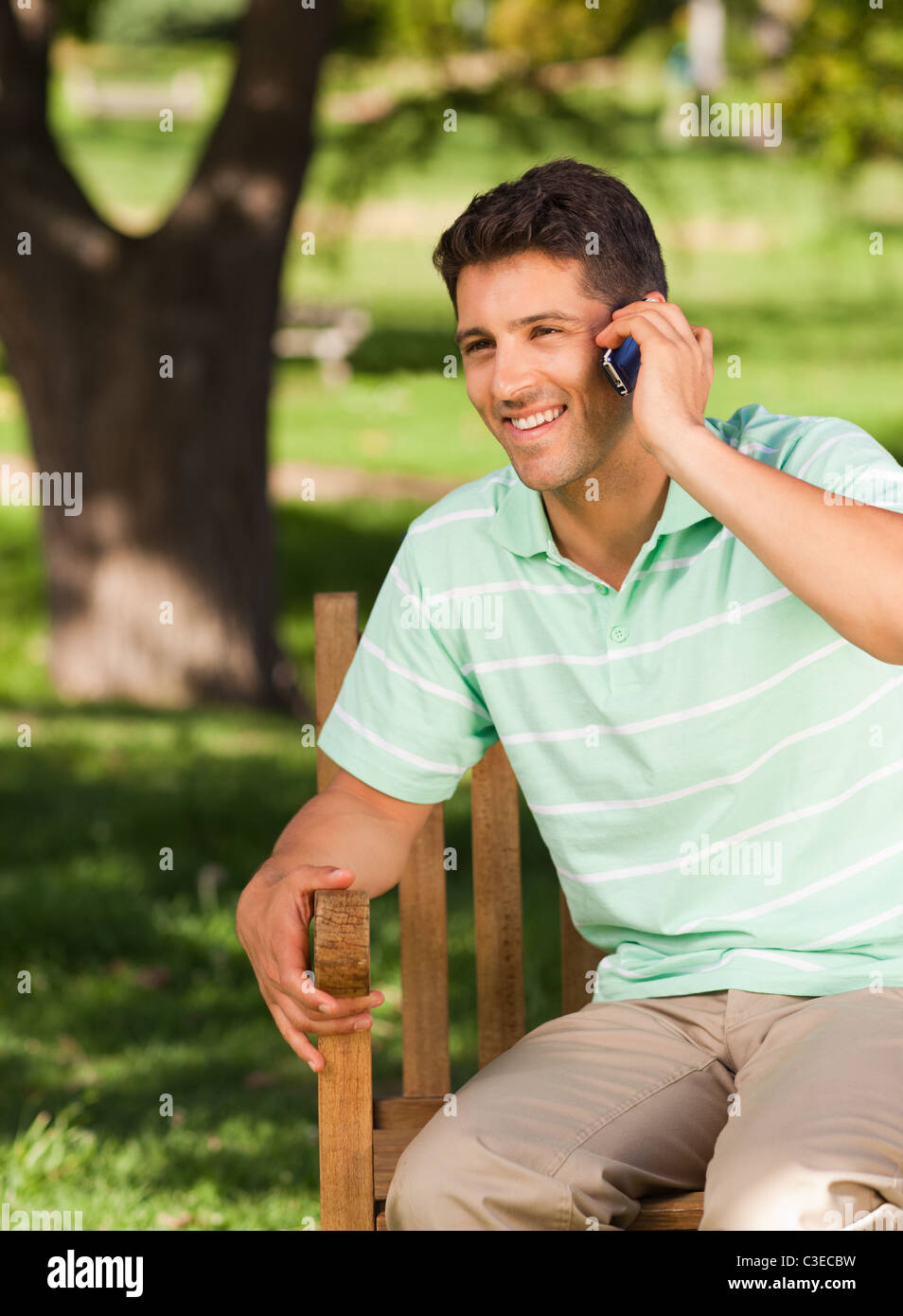 Young handsome man phoning Stock Photo - Alamy