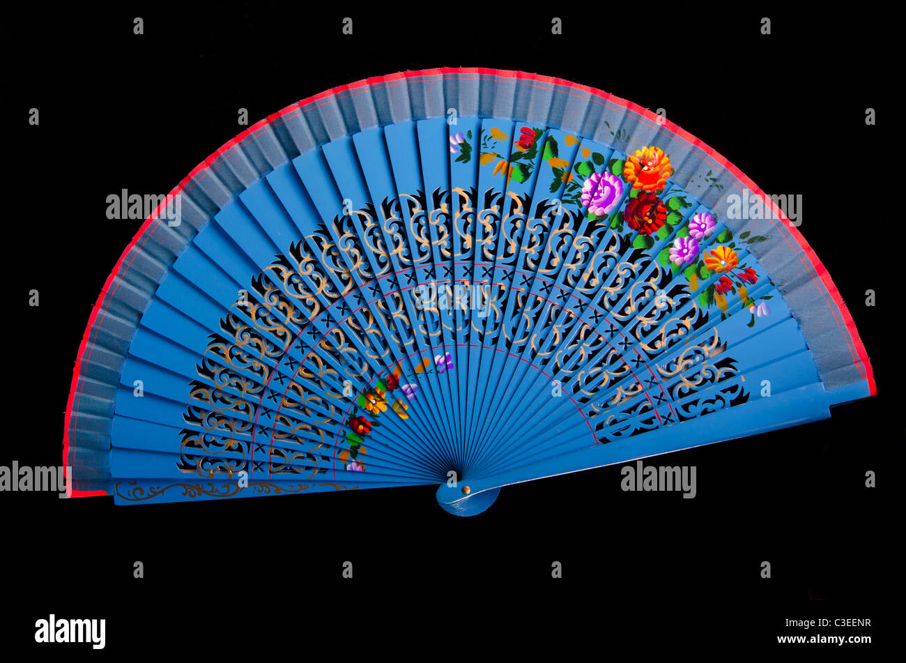 China blue hand fan isolated on black background Stock Photo - Alamy