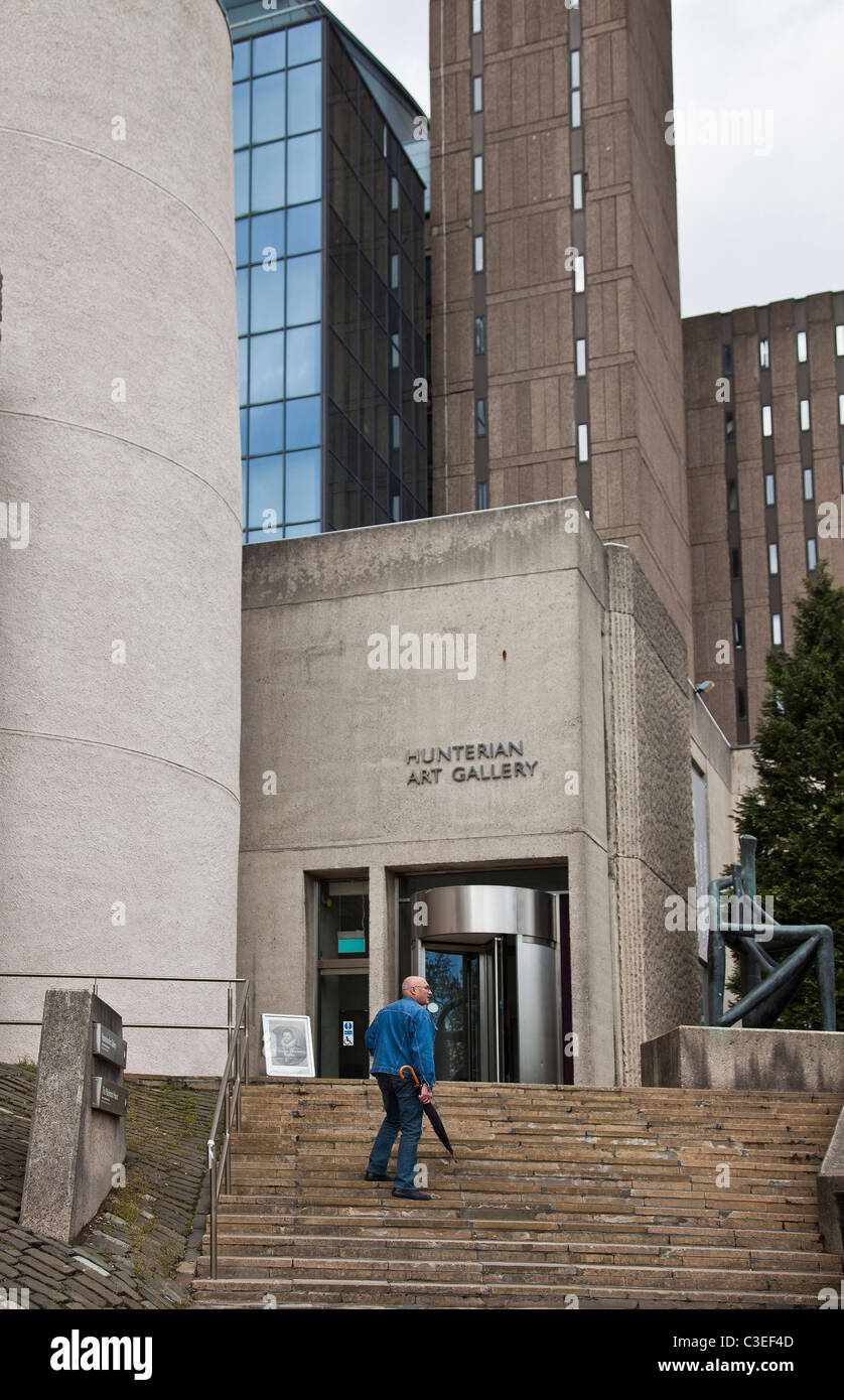 Visitor on the steps of the Hunterian Art Gallery, part of the Library ...