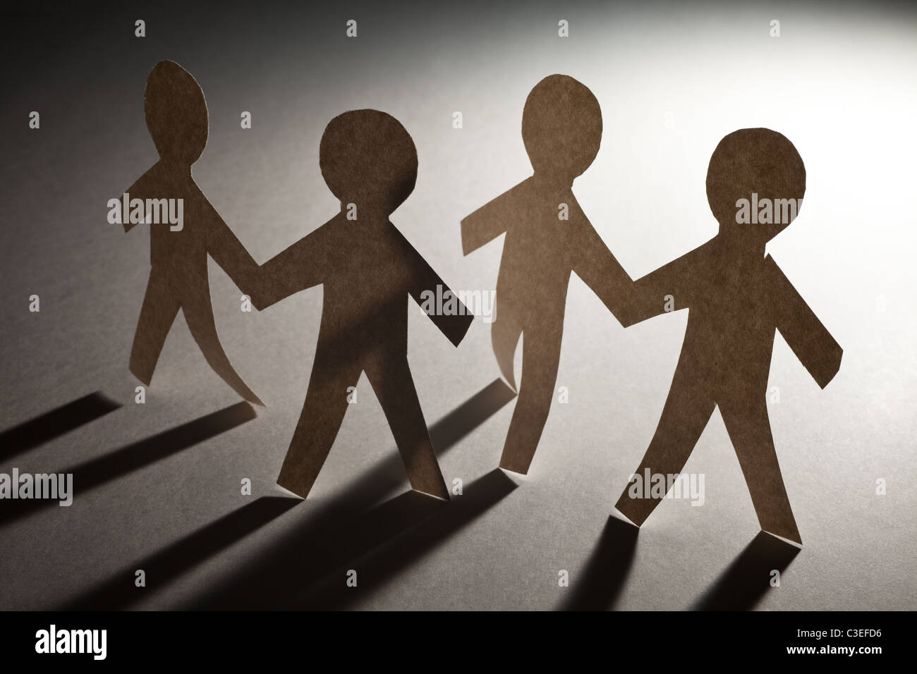 Paper Chain Men, concept of Teamwork Stock Photo - Alamy