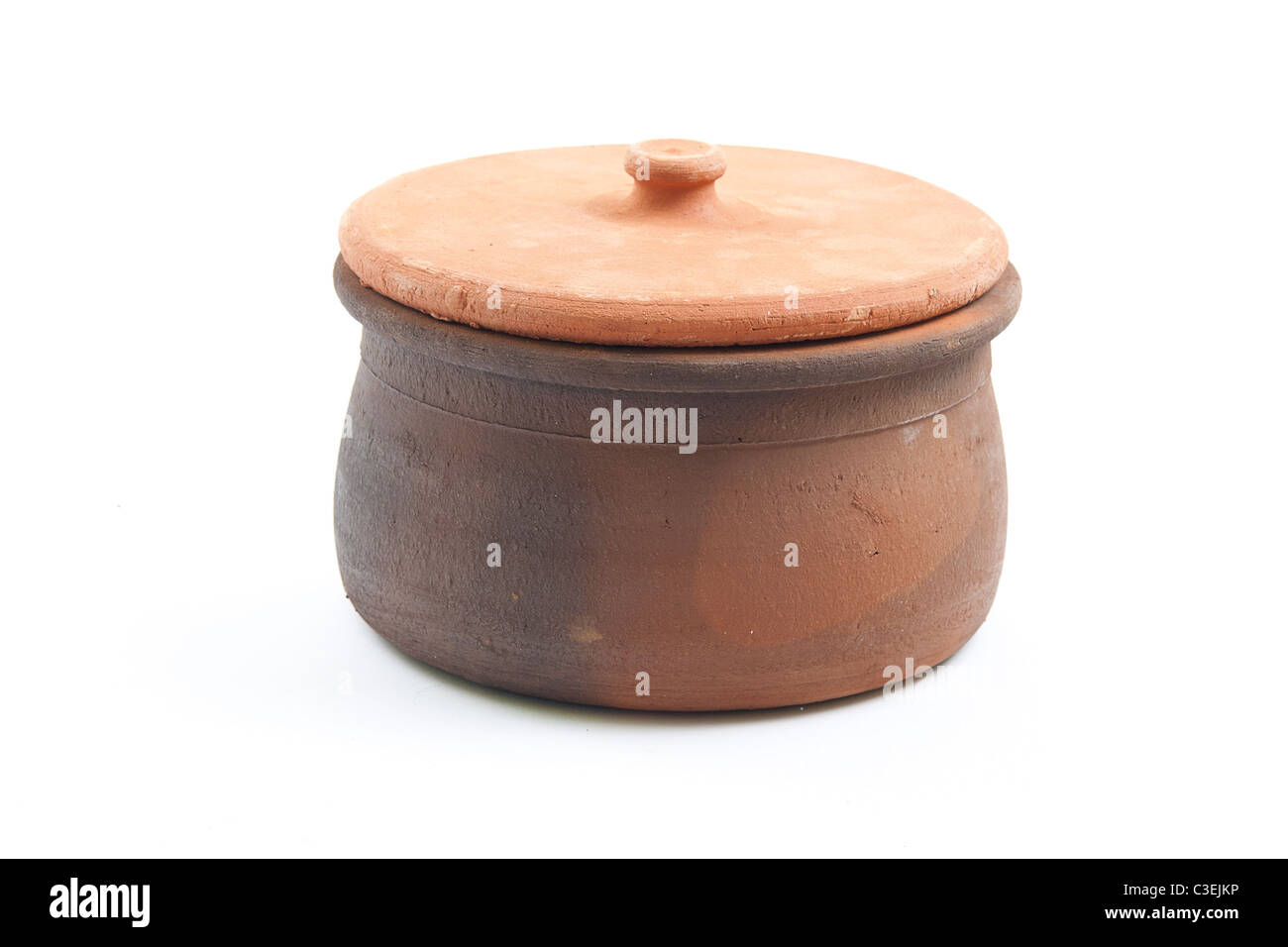 Ceramic pottery on white which is used in Turkish cuisine to cook ...