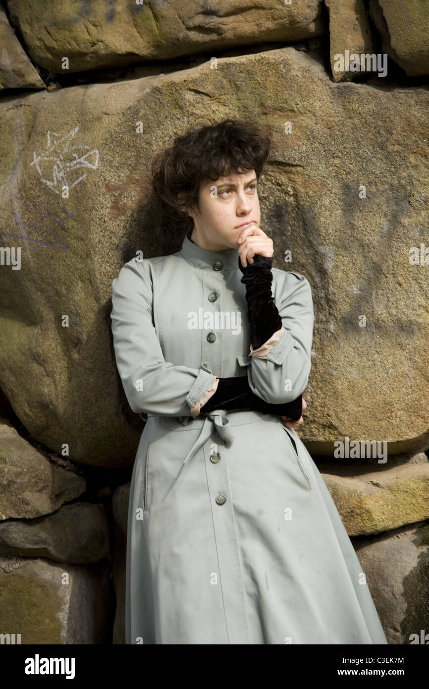 Young woman alone under a stone bridge in Prospect Park, Brooklyn, NY ...