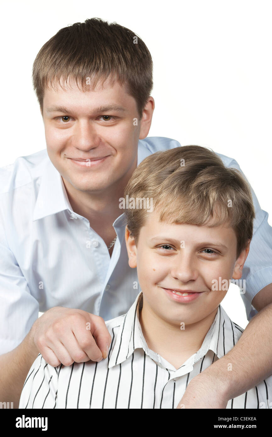 Two brothers. It is isolated on a white background Stock Photo - Alamy