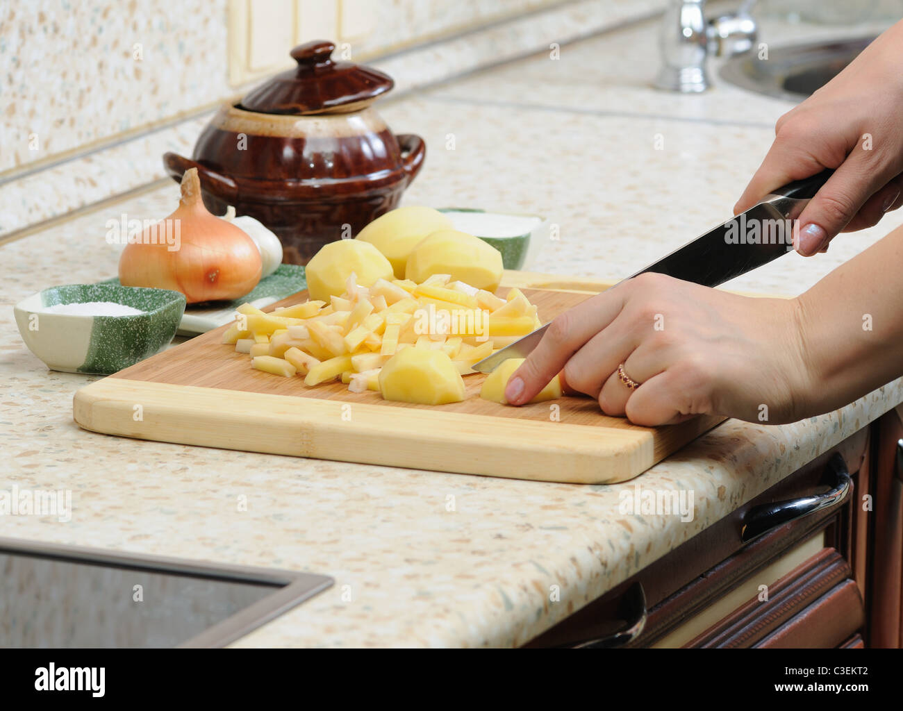 Meal preparation on kitchen from a potato Stock Photo - Alamy