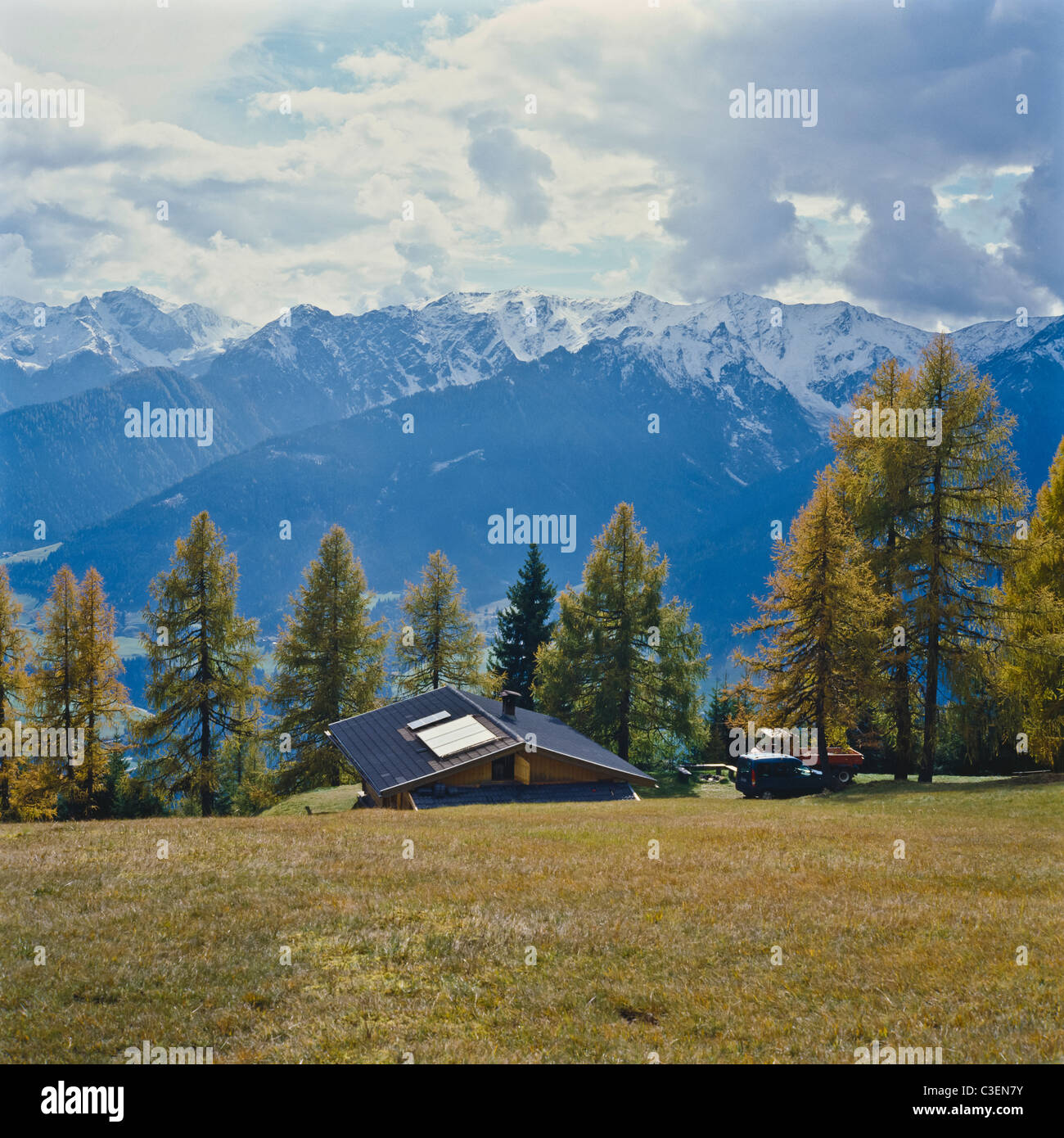 Mountains in Tyrol with alp cottage Stock Photo - Alamy