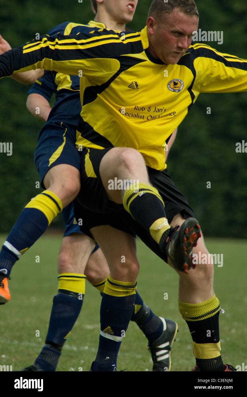 football tackle action,non league Stock Photo - Alamy