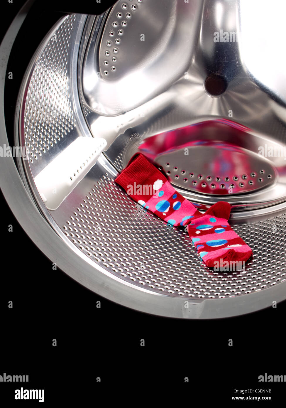 Red sock in wash hi-res stock photography and images - Alamy