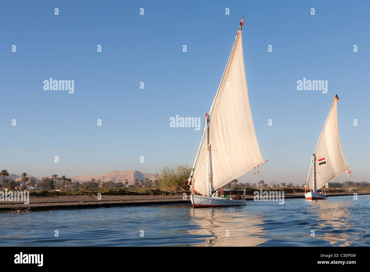 Two Felucca's sailing on the River Nile at sunset, Luxor, Egypt, North ...
