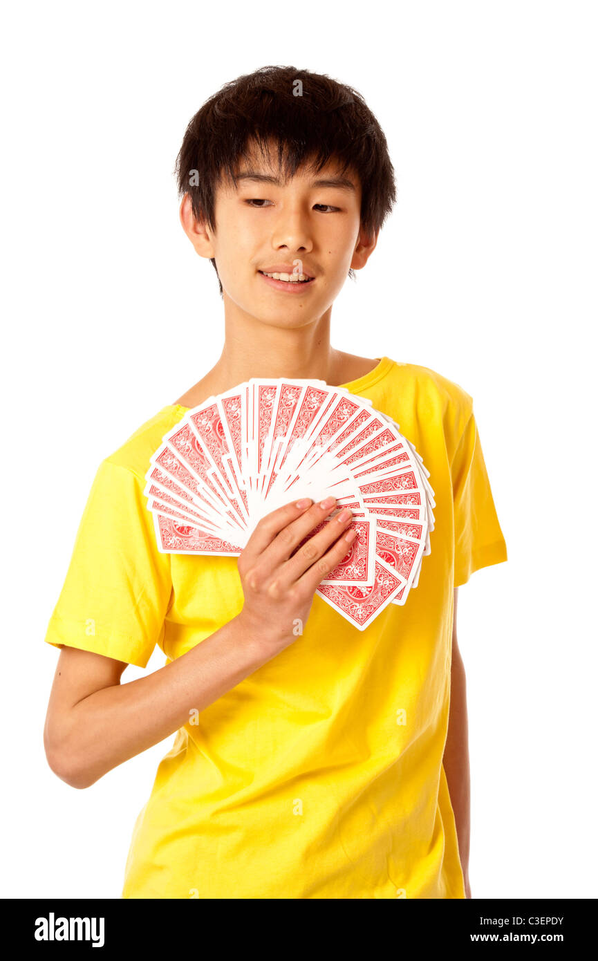 teenage Chinese Asian boy playing with cards Stock Photo - Alamy