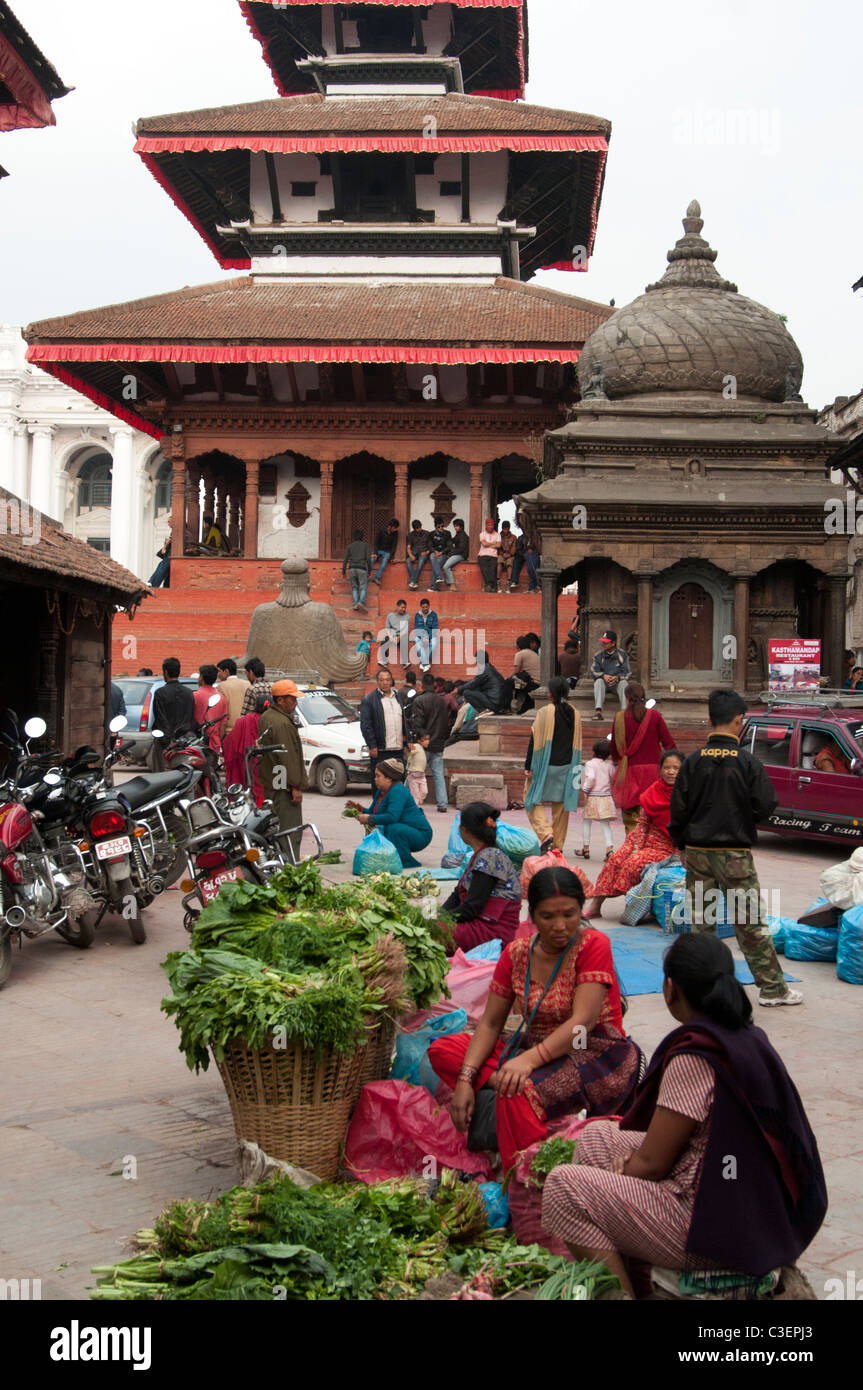 Durbar Square, Kathmandu, scene with Trailokya Mohan pagoda at rear ...