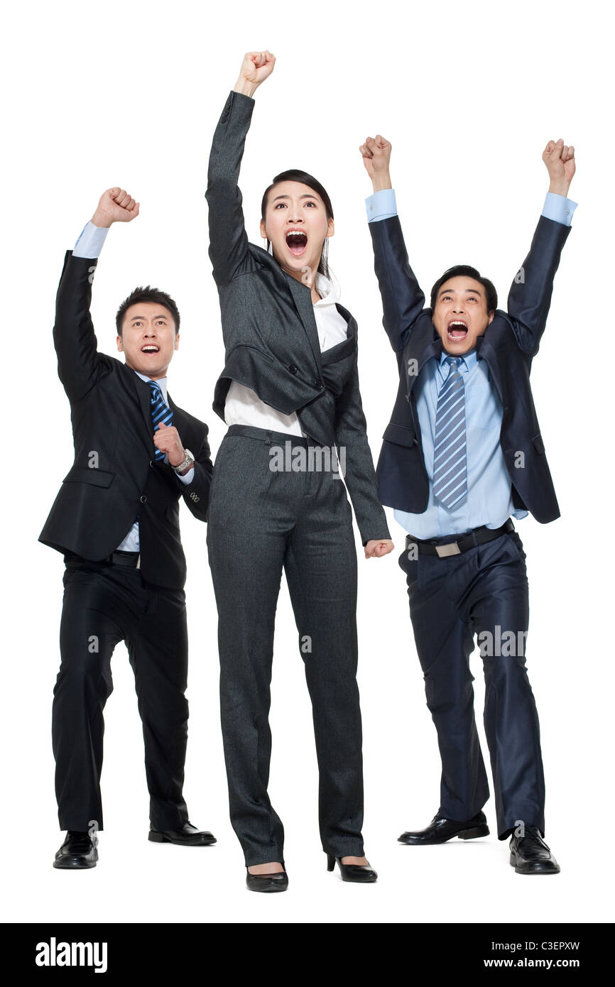 A team of businesspeople cheering Stock Photo - Alamy