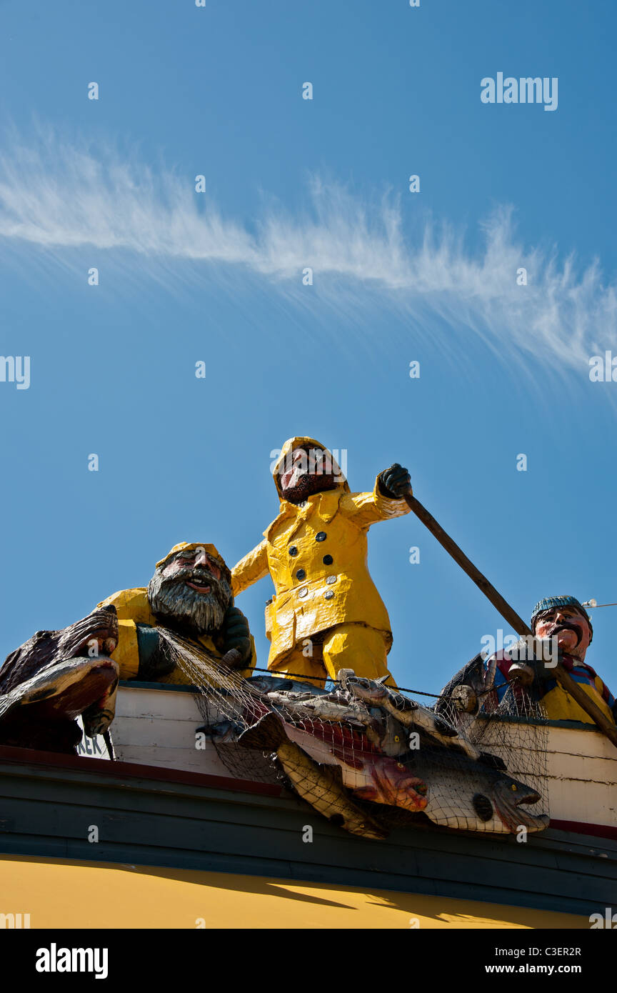 Fisherman wooden sculpture hi-res stock photography and images - Alamy