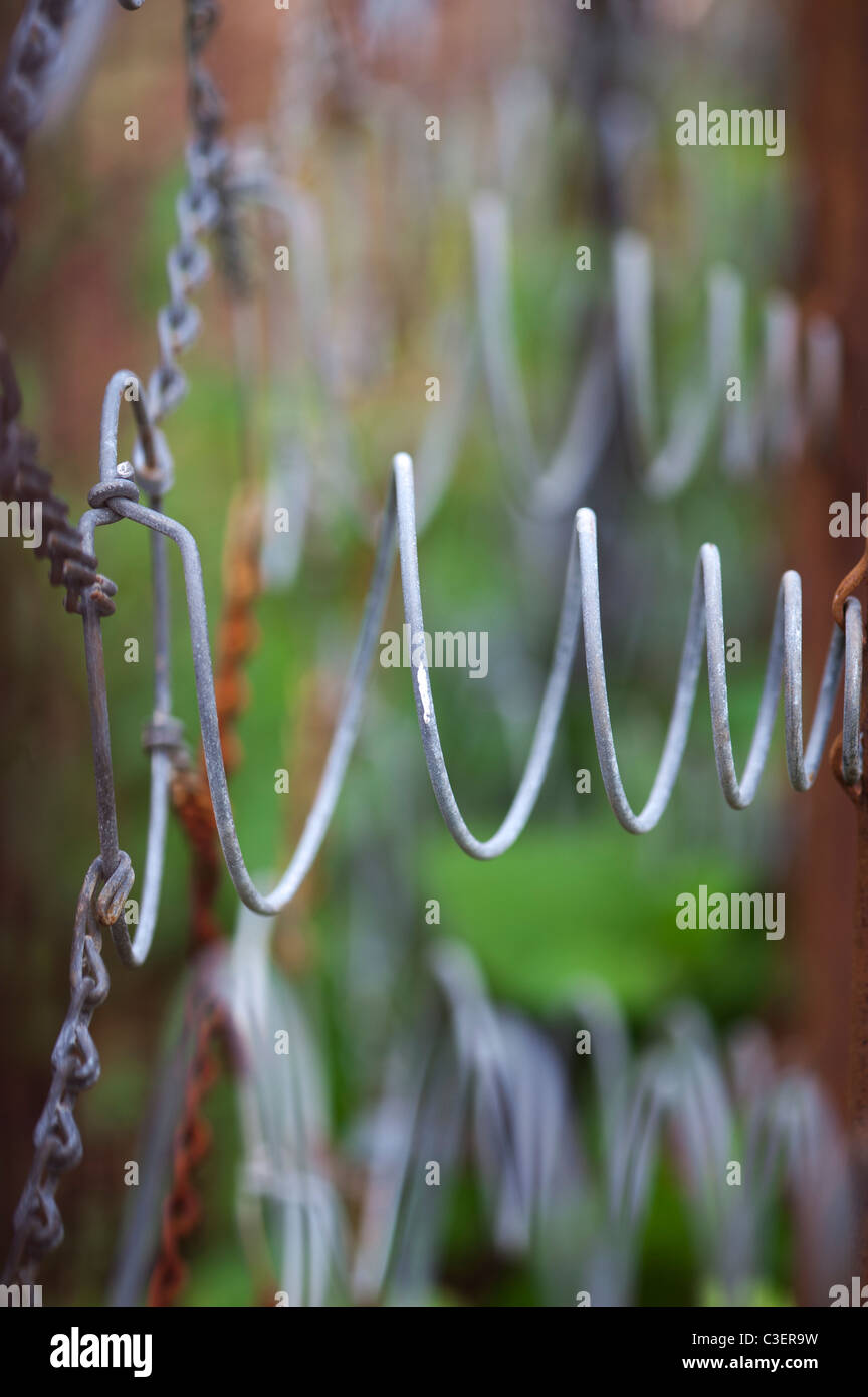 Old rusty bed springs and chains Stock Photo - Alamy
