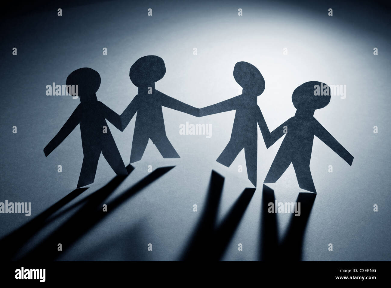 Paper Chain Men, concept of Teamwork Stock Photo - Alamy