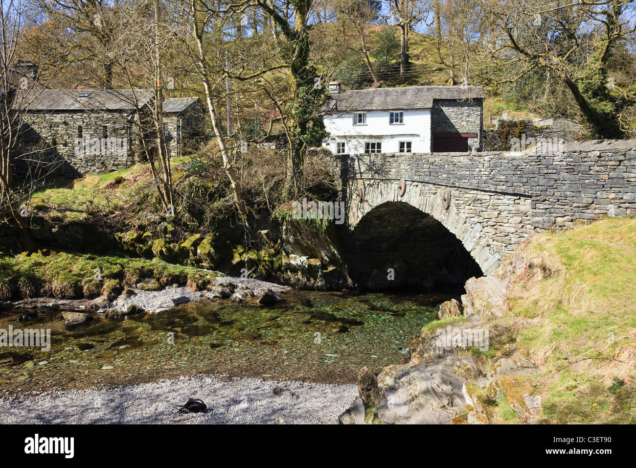 Old stone bridge over Great Langdale Beck in Elterwater, Lake District ...