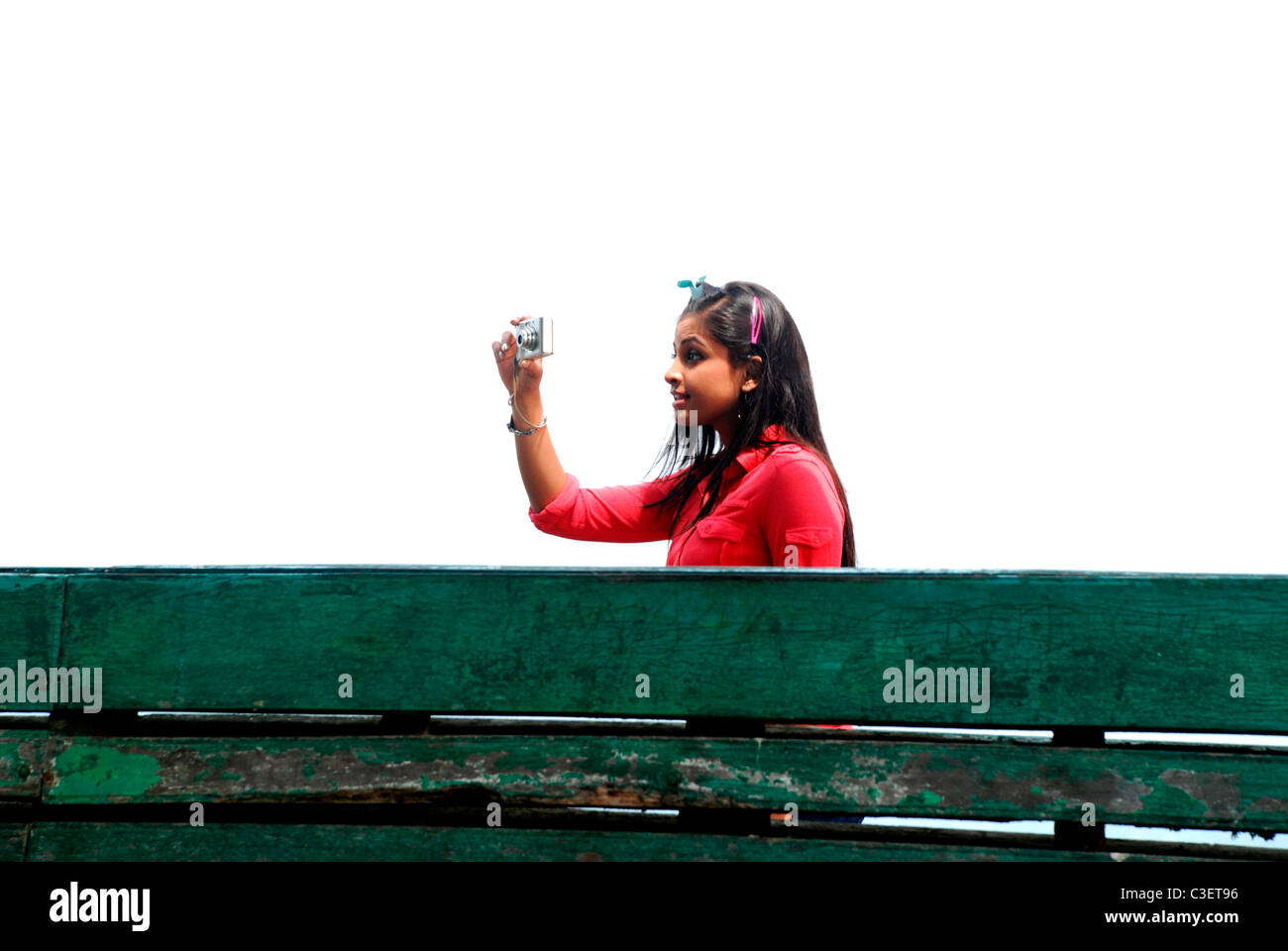 An Indian girl clicking camera Stock Photo - Alamy
