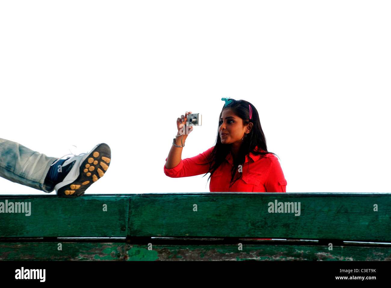 An Indian girl clicking camera Stock Photo - Alamy