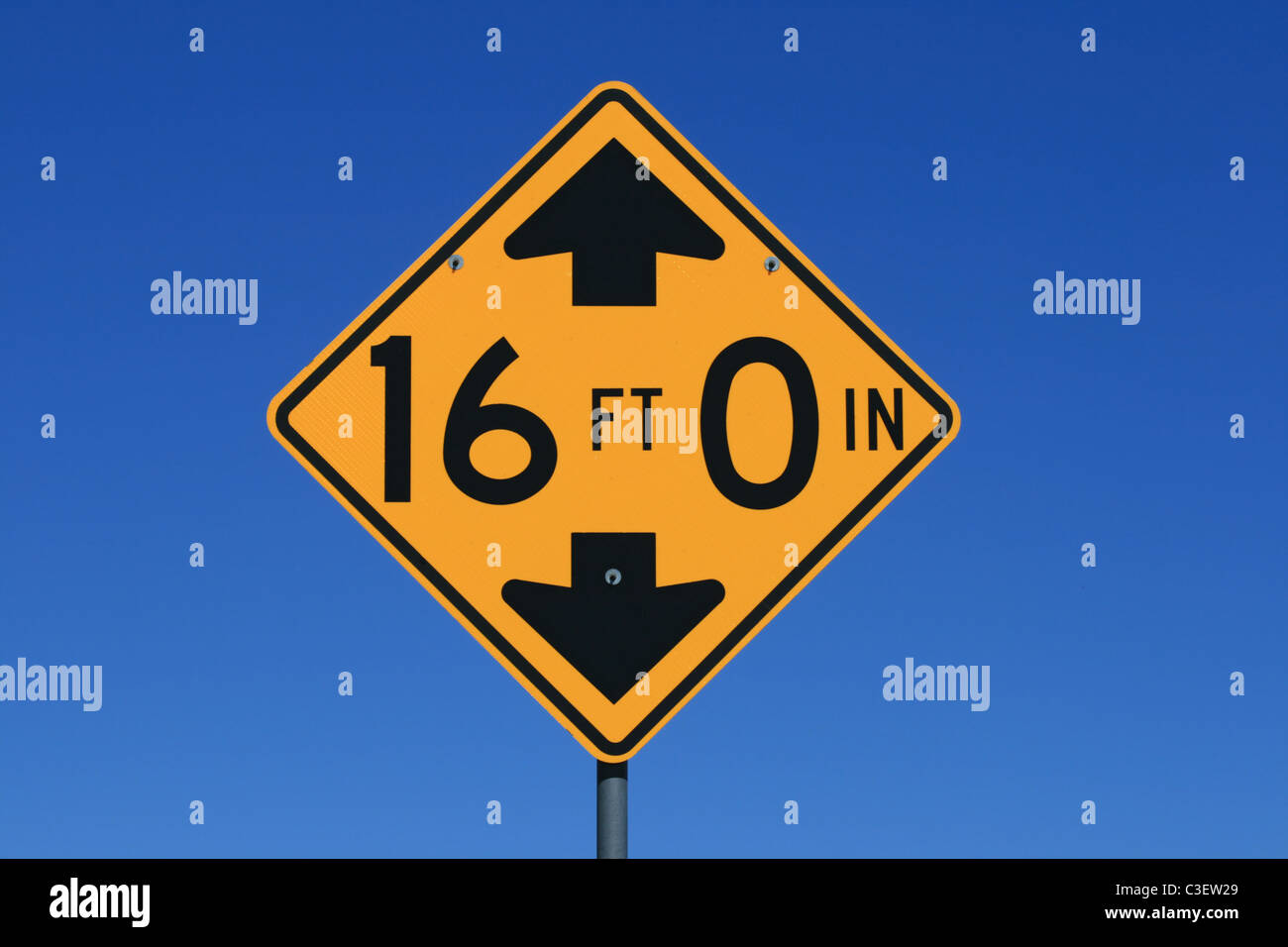 16 feet height clearance road sign with blue sky background Stock Photo ...