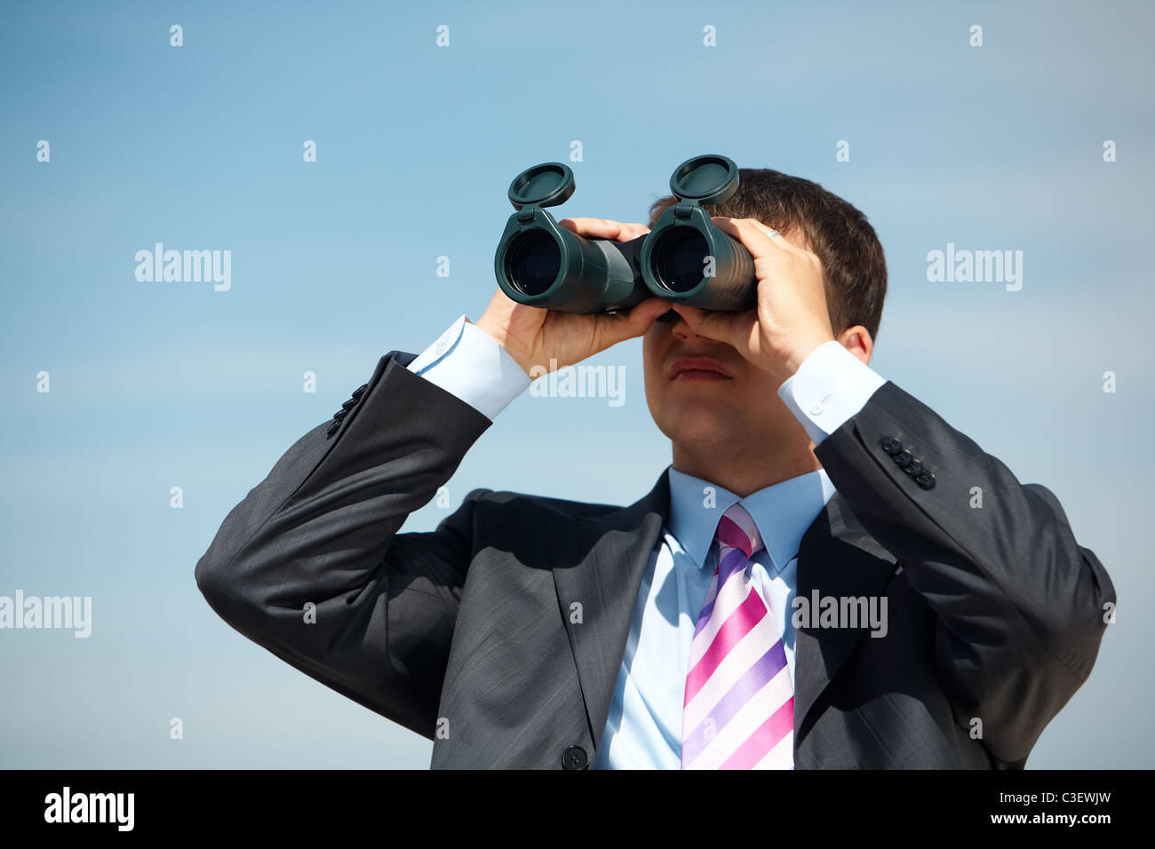 Black business man binocular hi-res stock photography and images - Alamy