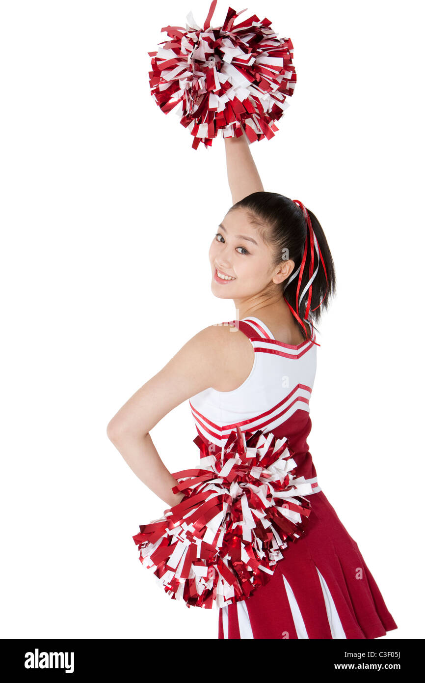 Portrait of a cheerleader in red Stock Photo - Alamy