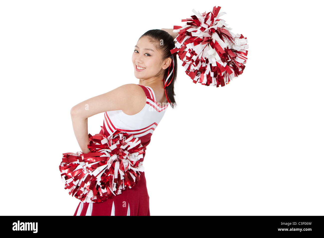 Portrait of a cheerleader in red Stock Photo - Alamy