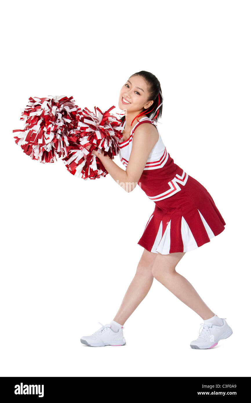 Portrait of a cheerleader in red Stock Photo - Alamy