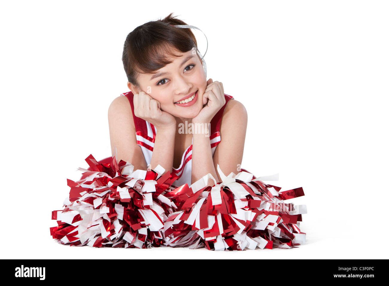 Portrait of a cheerleader in red Stock Photo - Alamy